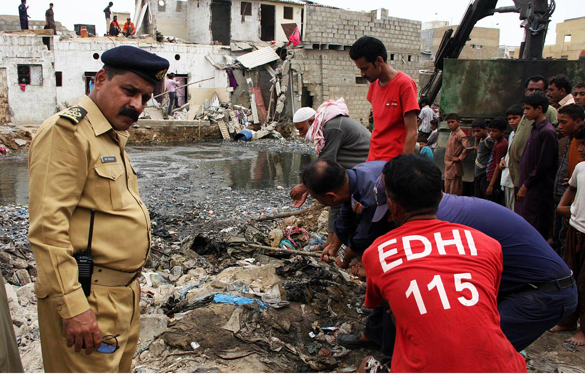 Rescue Workers Helping Their Colleague During Rescue Work - Flare Magazine